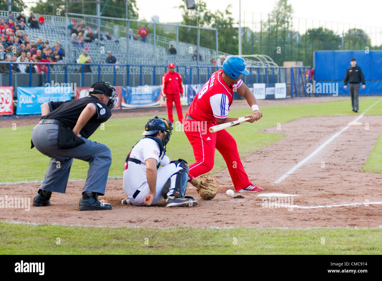 HAARLEM, THE NETHERLANDS, 15/07/2012. Infielder José Abreu (right, Cuba ...