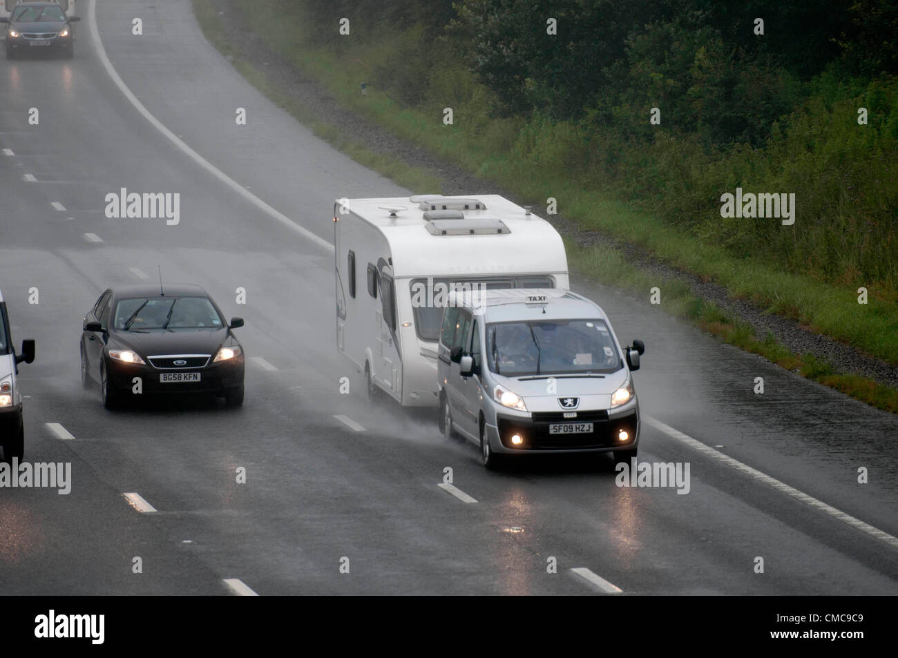 Towing caravan rain hi-res stock photography and images - Alamy