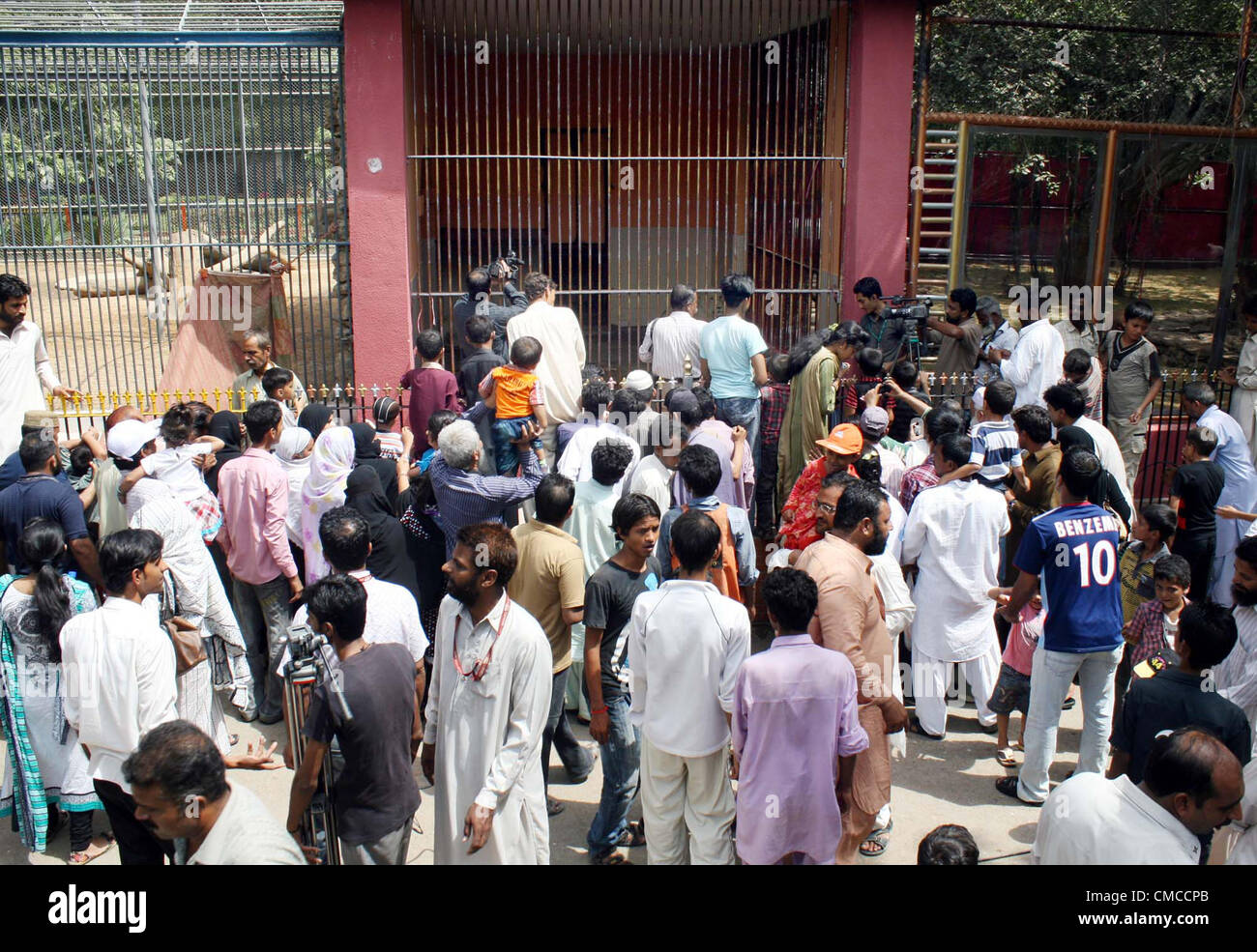 KARACHI, PAKISTAN, JUL 17: People gather to see newly purchased two ...