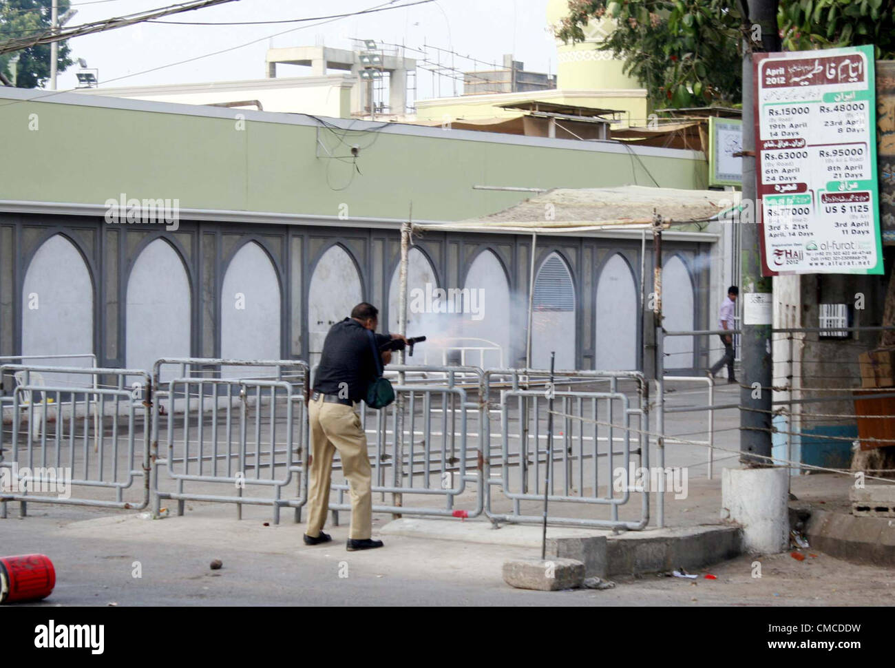 Police official fire tear gas shell to disperse protesters belong to ...