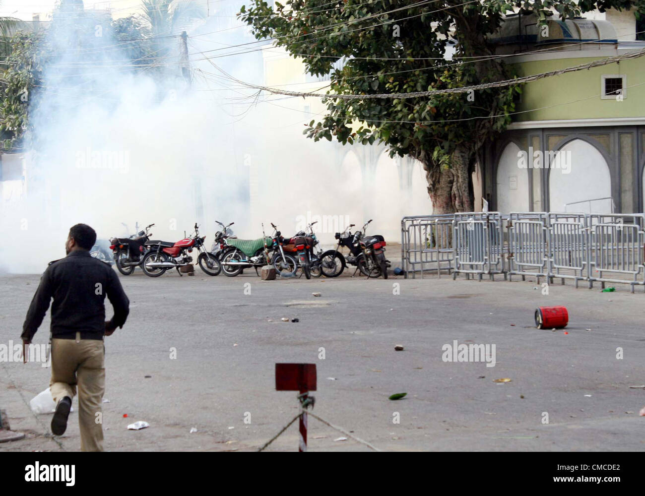 Police official fire tear hi-res stock photography and images - Alamy