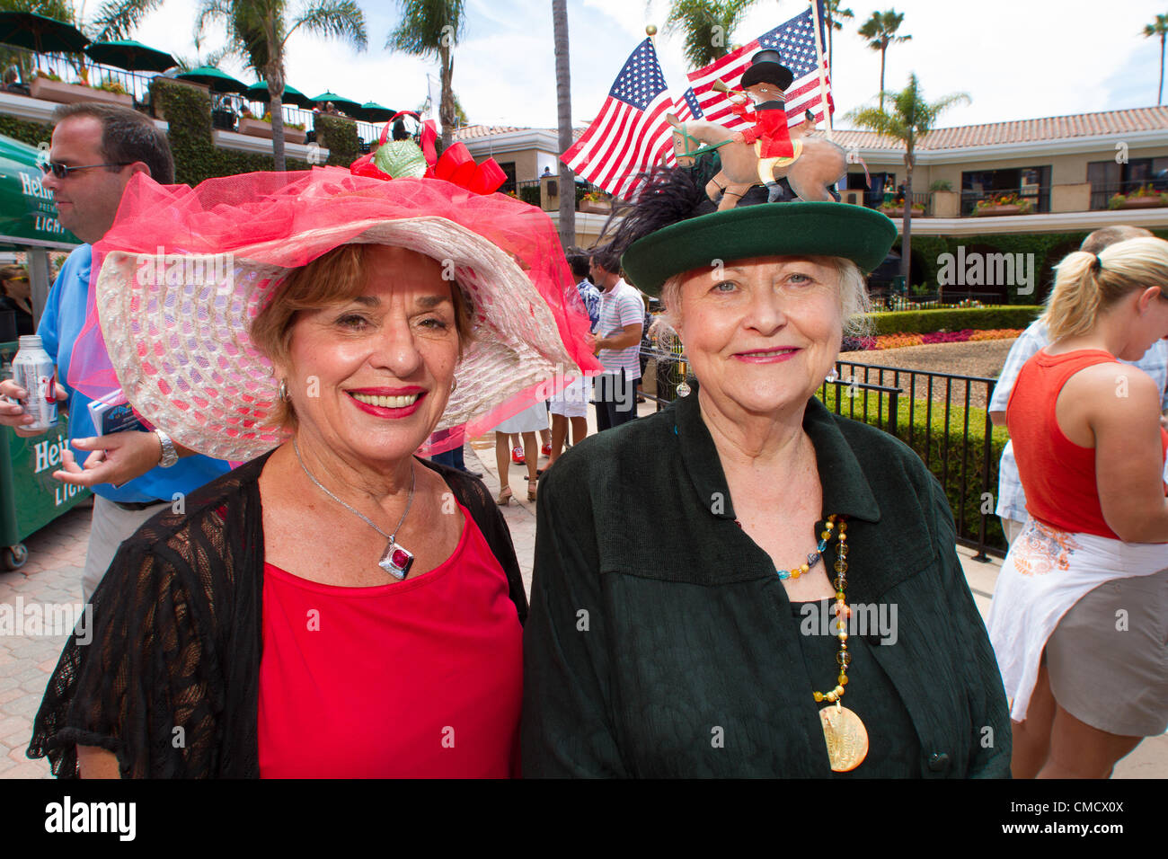 July 18, 2012 - Delmar, California, U.S - Race fans pose showing off ...