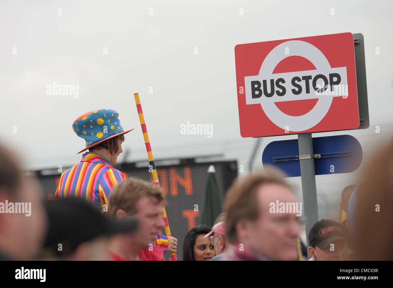 20th July 2012, Silverstone, UK An entertainer on stilts, stood by a ...
