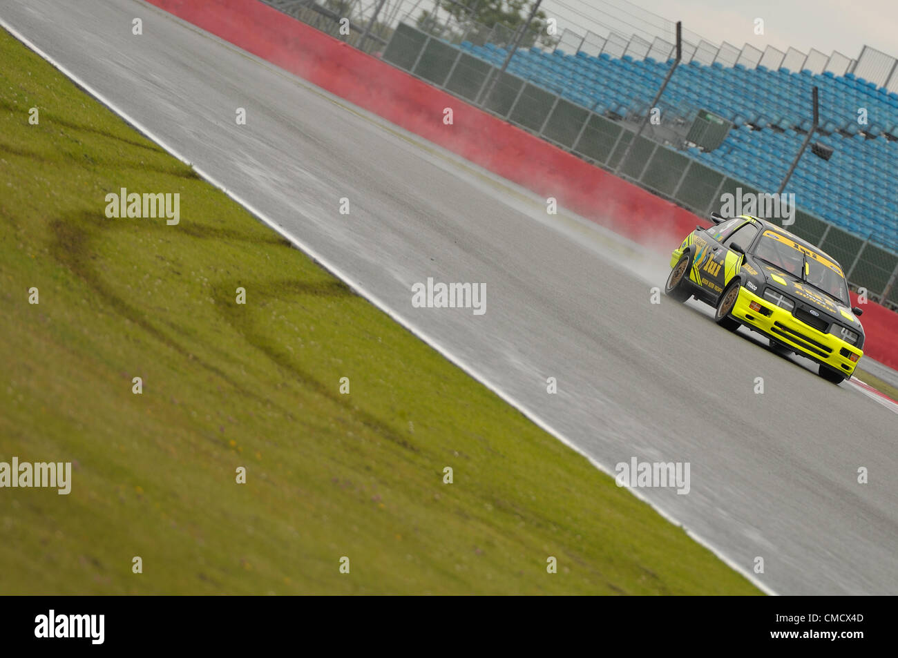 20th July 2012, Silverstone, UK Simon Garrad's Ford RS500 in the rain ...