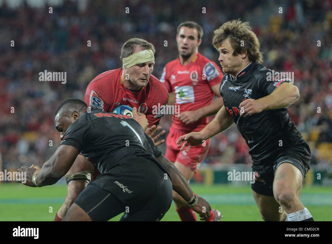 21.07.2012 Brisbane, Australia. Adam Wallace-Harrison being tackled in ...