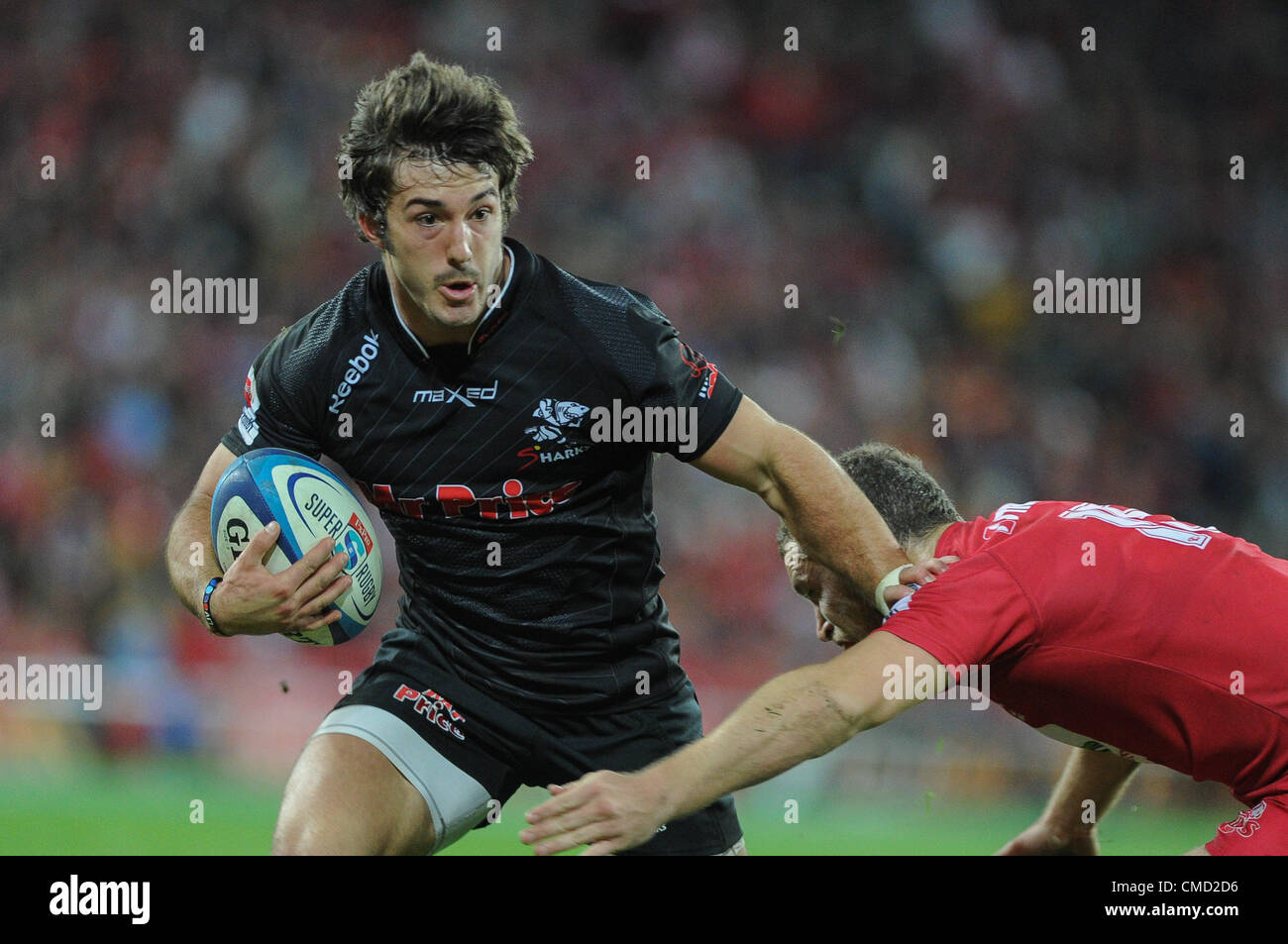 21.07.2012 Brisbane, Australia. Tim Whitehead fending of a tackle ...