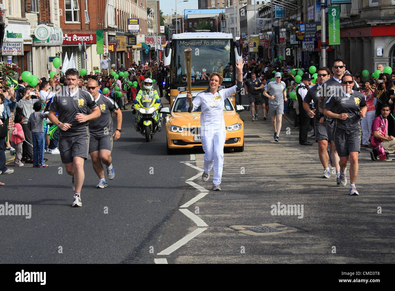 Ilford, UK. 22nd July 2012. Torch relay arrives in Redbridge. Hundreds ...