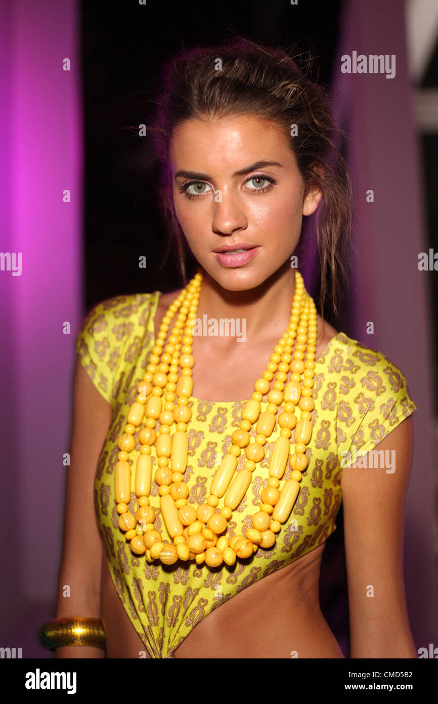 July 21, 2012 - Miami Beach, Florida, U.S. - A model poses backstage at ...