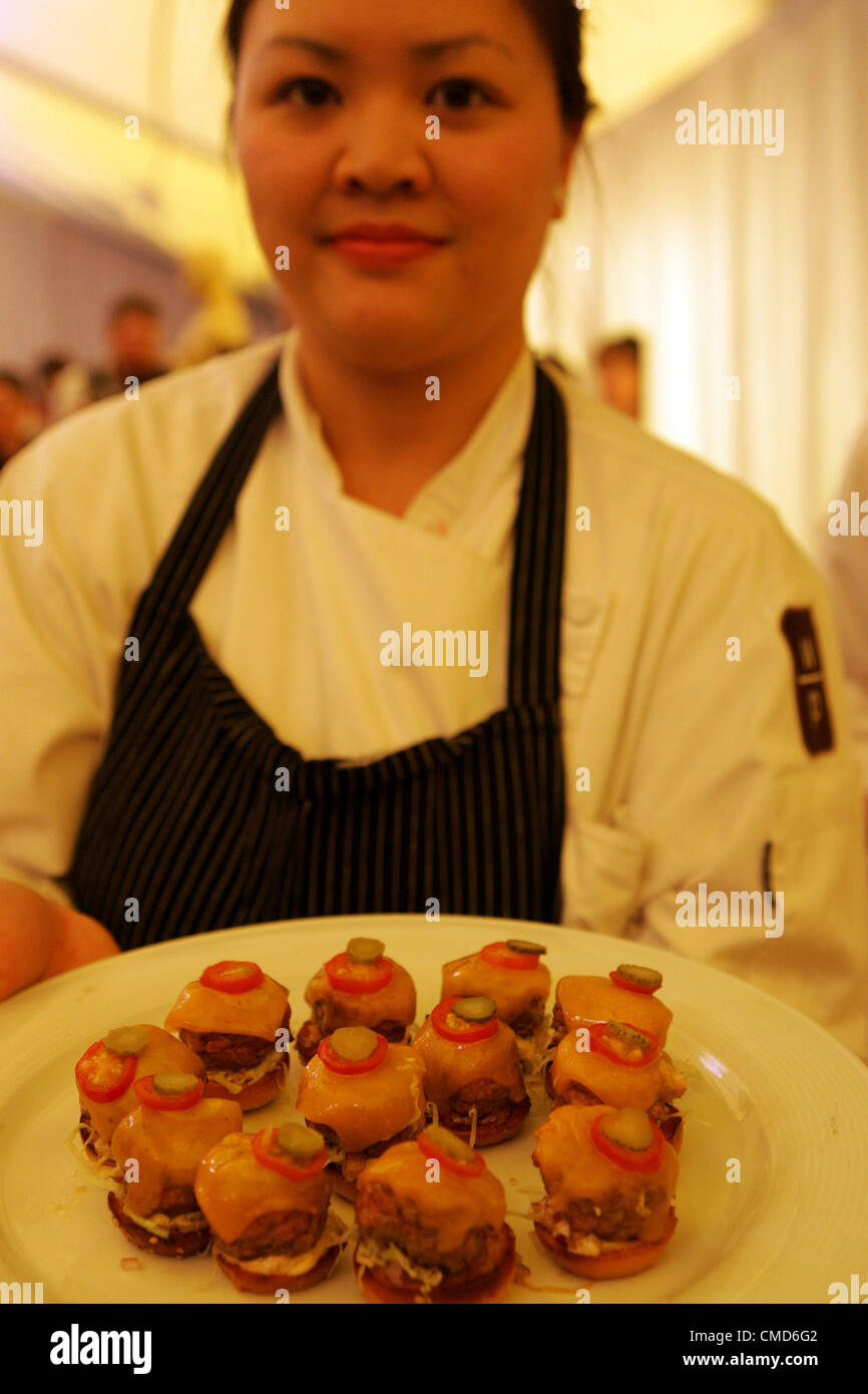 LOS ANGELES, Feb. 24, 2012 A waitress shows a plate of mini kobe ...