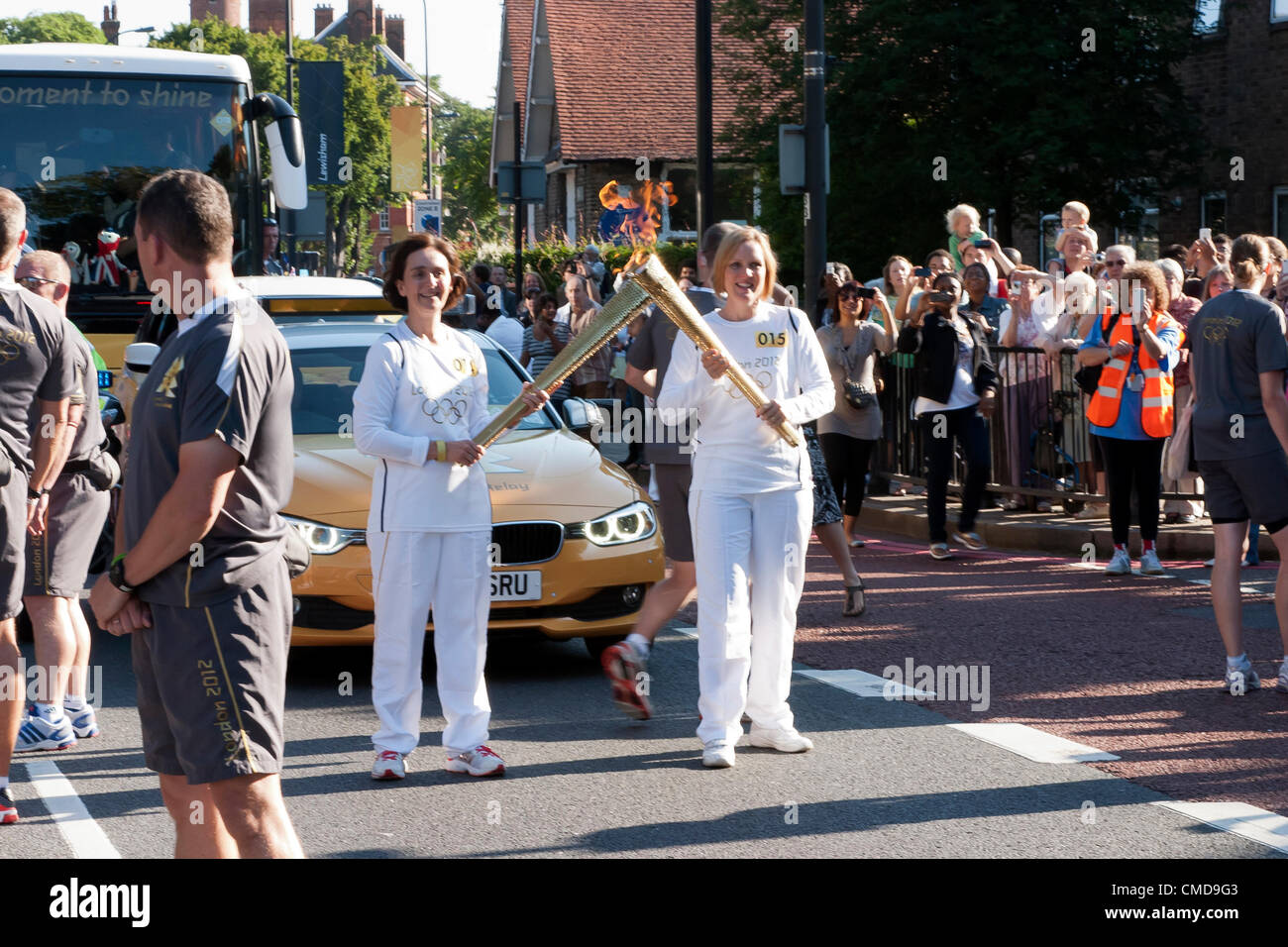 Handover of the Olympic Torch to Jaime Minter-Green (right), at ...