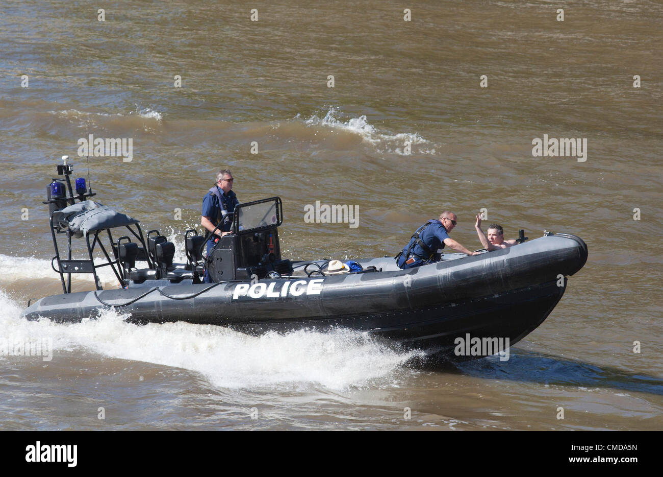 London, England, UK. Monday, 23 July 2012. A man today, Monday 23rd ...