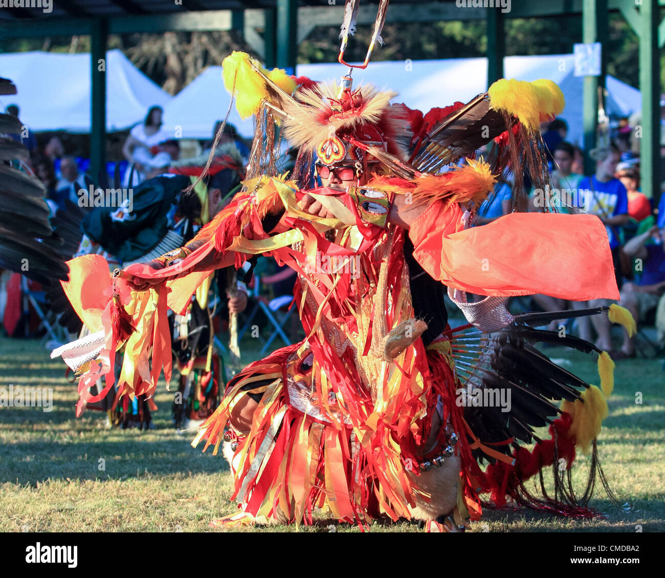 Native Americans from around North America gathered to sing, dance, and ...
