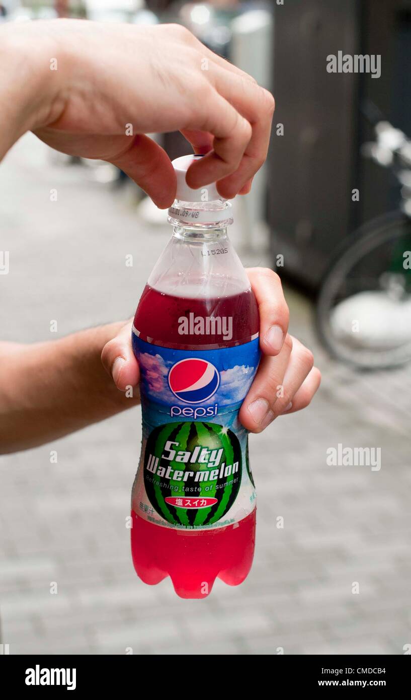 July 24, 2012, Tokyo, Japan – A man tries Pepsi Salty Watermelon. Pepsi ...