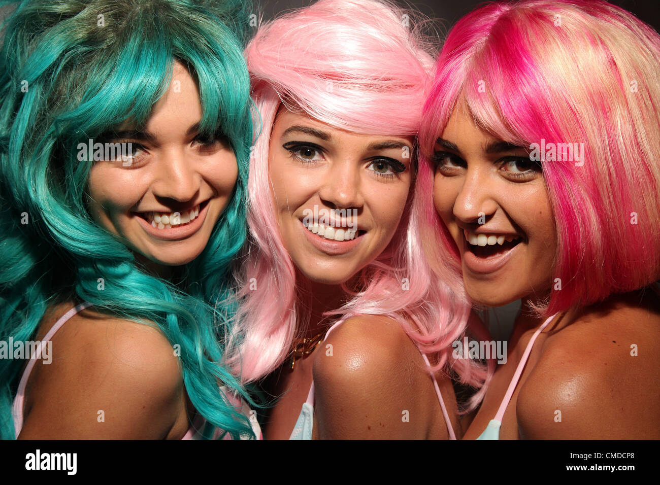 July 23, 2012 - Miami Beach, Florida, U.S. - Models pose backstage at ...