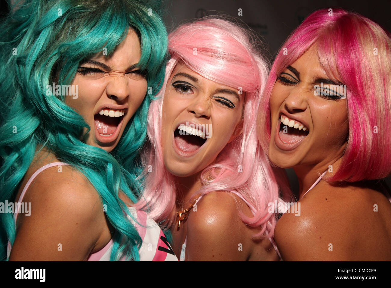 July 23, 2012 - Miami Beach, Florida, U.S. - Models pose backstage at ...