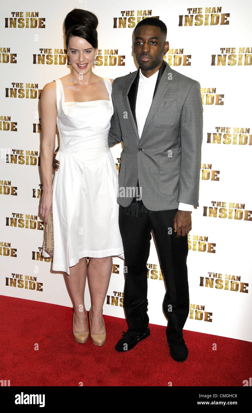 Michelle Ryan and Ashley Thomas - UK premiere of 'The Man Inside' at the Vue, Leicester Square ...