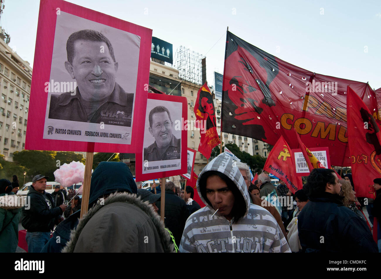 Signs with Hugo Chavez' portrait are seen at a demonstration held at ...
