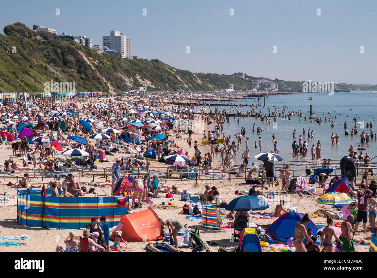 Bournemouth, People enjoying summer weather on East Beach, Dorset ...