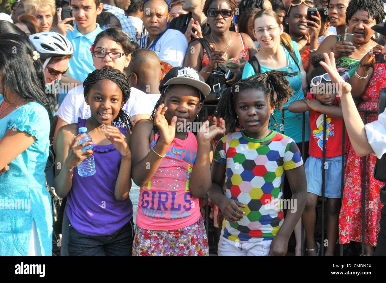 Wood Green, London, UK. 25th July 2012. The crowd enjoy the Olympic ...