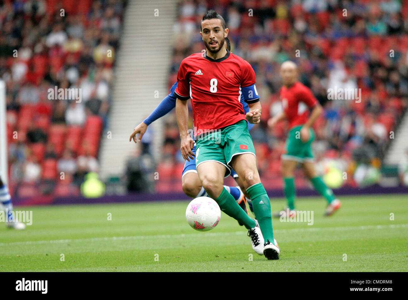 26.07.2012 Glasgow, Scotland. 8 Driss Fettouhi (c) in action during the ...