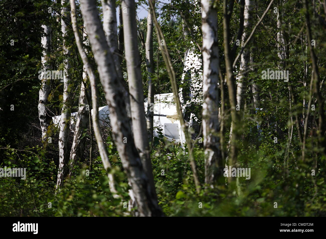Jastarnia, Poland. Plane hanging on the trees. Single-engine aircraft ...