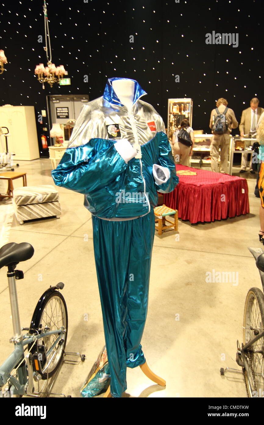 2012 jimmy savile track suit shell suit auction blue hi-res stock ...