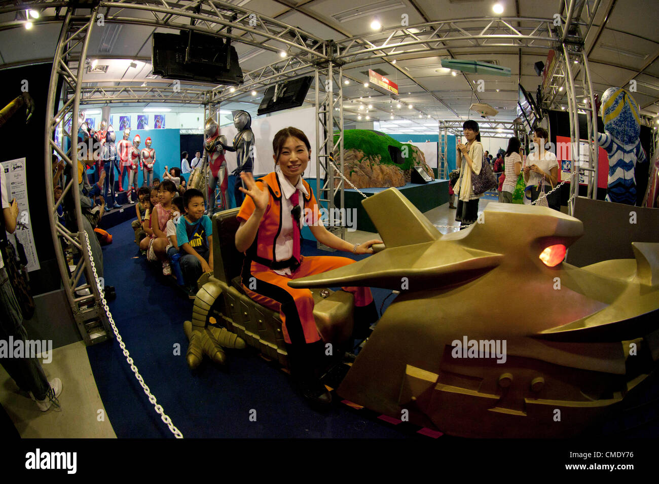 July 27 2012, Tokyo, Japan - Children and adults get on a mini train at ...