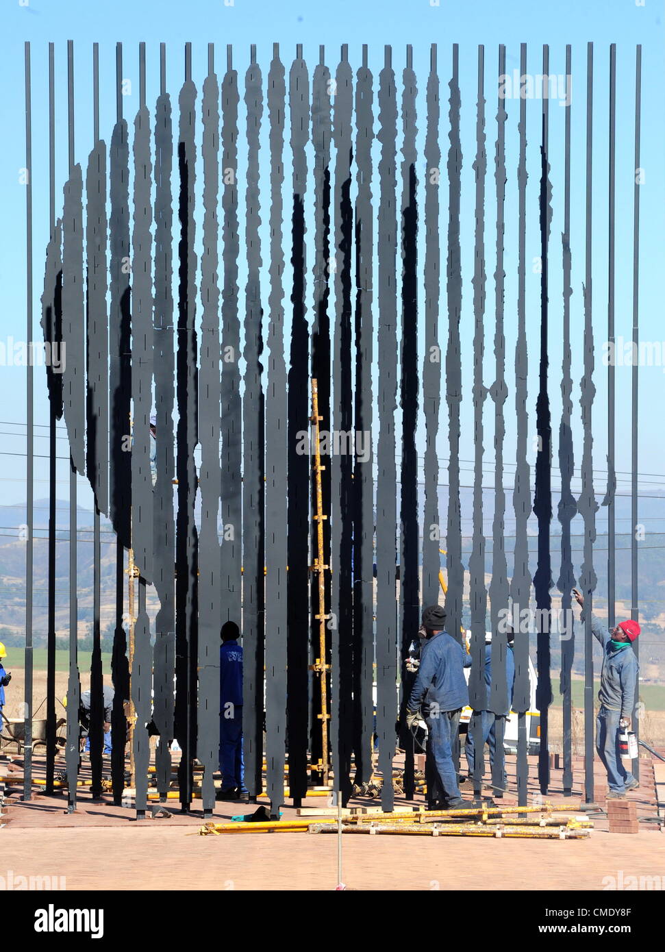 KWAZULU NATAL, SOUTH AFRICA: Construction workers add the final touches ...