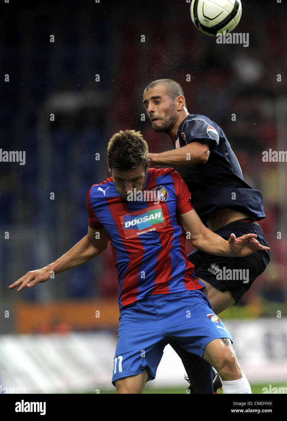 Revaz Getsadze (right) of Metalurgi and Martin Fillo of Plzen in their ...