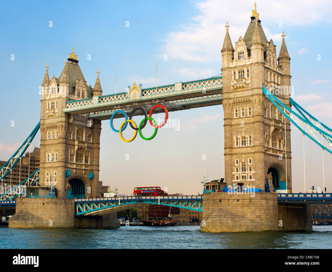 London, UK. 25 July, 2012. Tower Bridge, London, with Olympic Rings 4 ...
