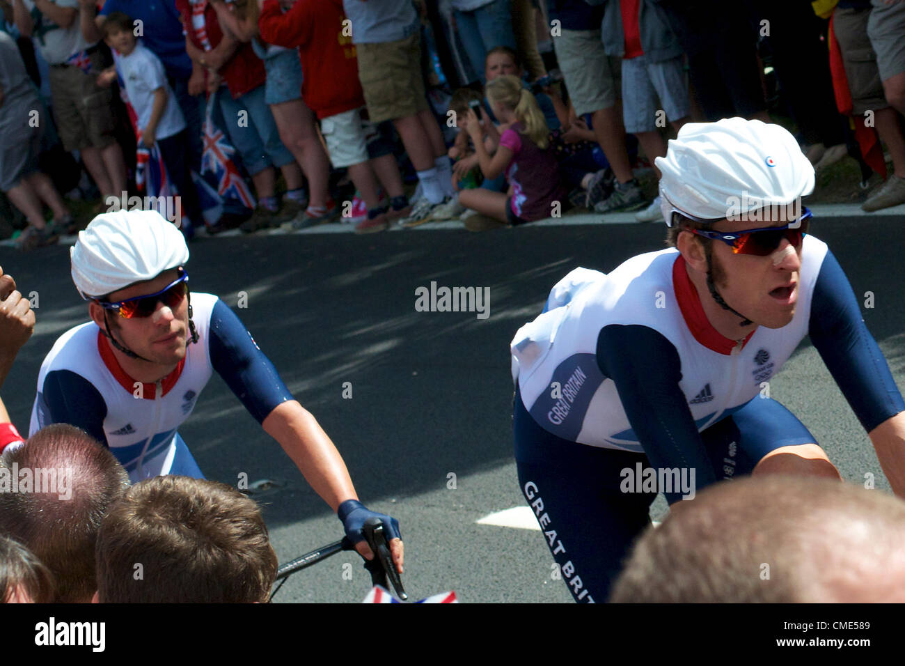 Bradley Wiggins leads Mark Cavendish in the Peloton of the London 2012 ...
