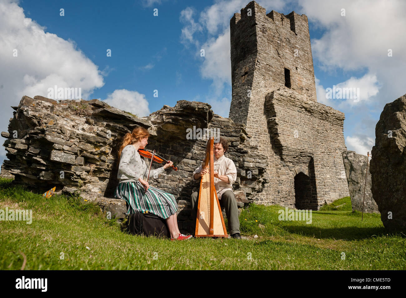 Traditional welsh folk musicians performing outdoors on the fiddle and ...