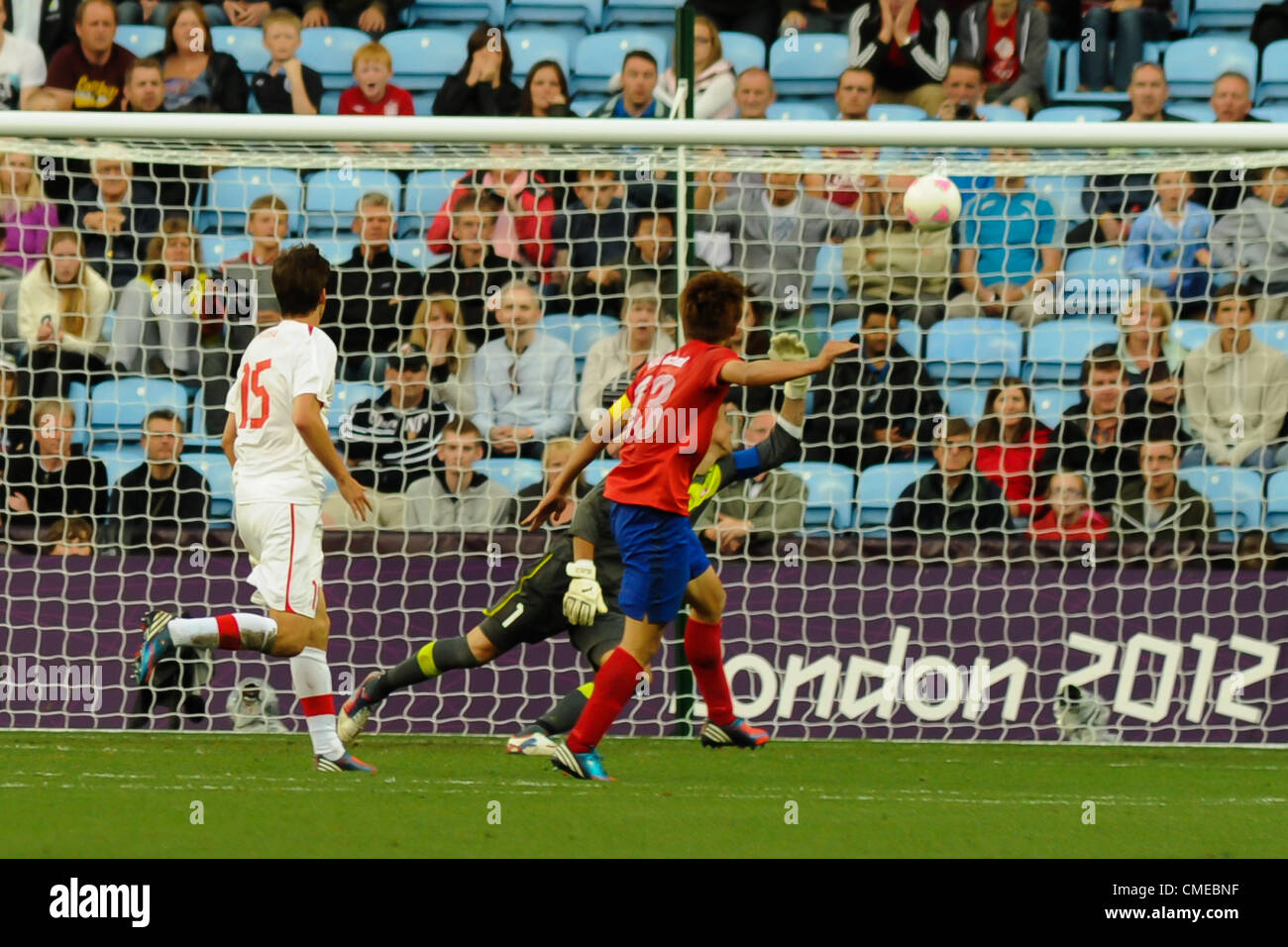 29.07.2012 Coventry, England. Swiss goalkeeper watches as this shot ...
