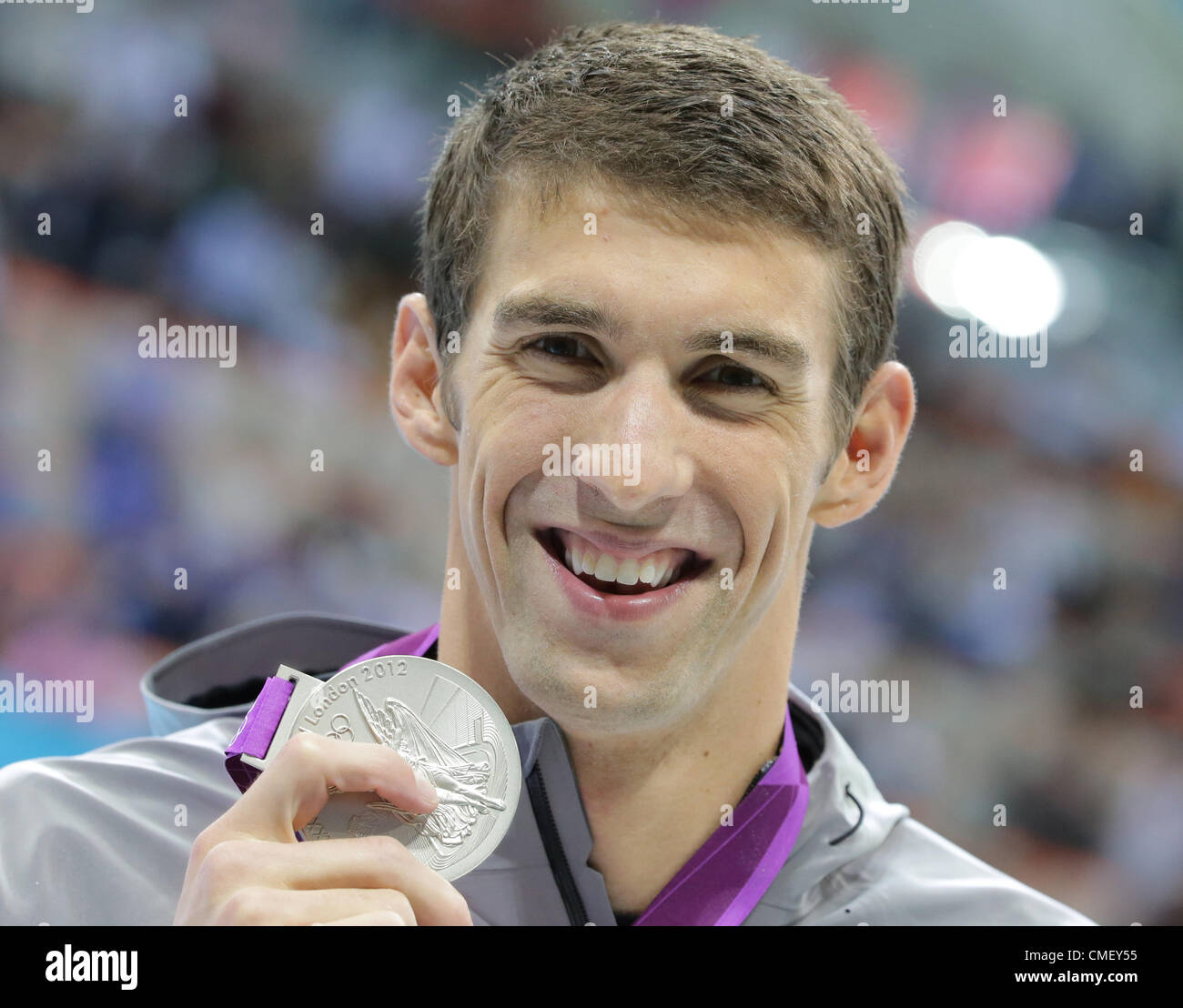 31.07.2012. London, England. Michael Phelps of the USA shows his silver ...