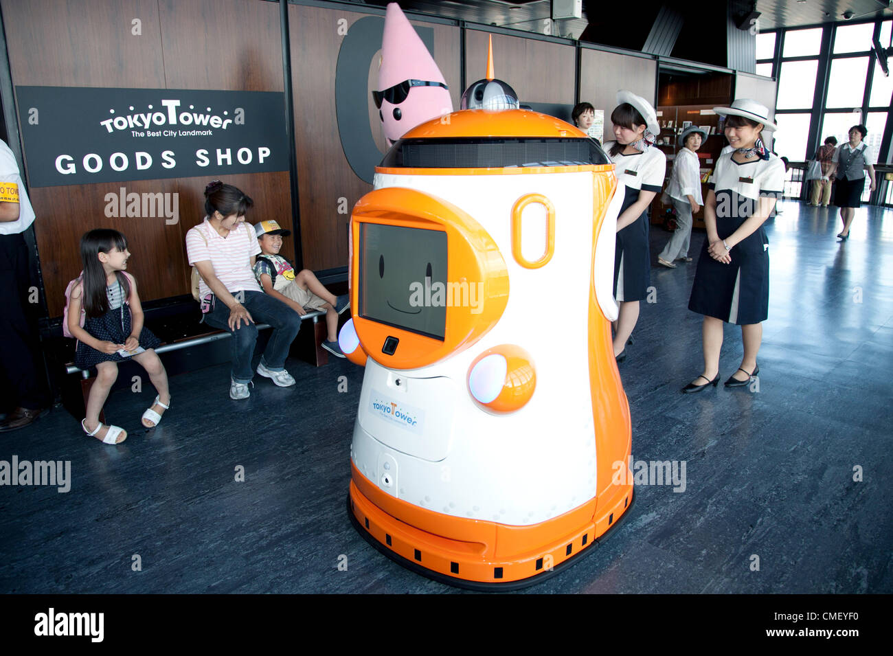 August 01 2012, Tokyo, Japan - Visitors see the new robot guide "Tawabo ...