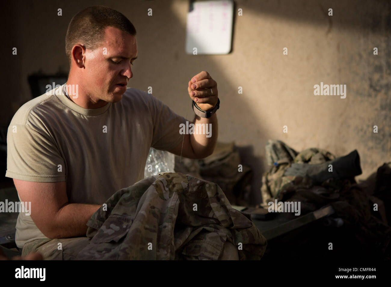 Torn uniform hi-res stock photography and images - Alamy