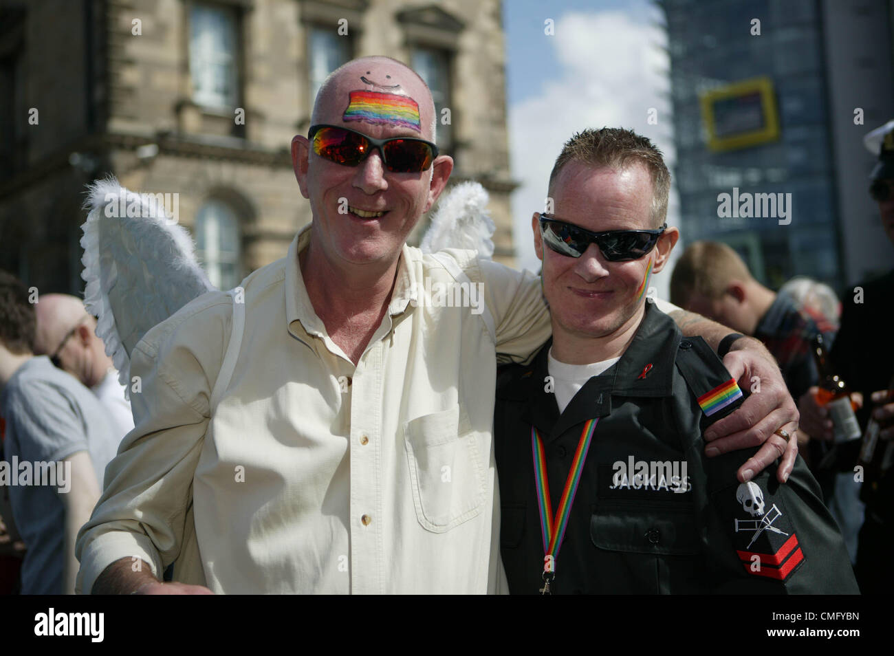 Two gentleman A man dressed with gold Angel wings at the 2012 Belfast ...