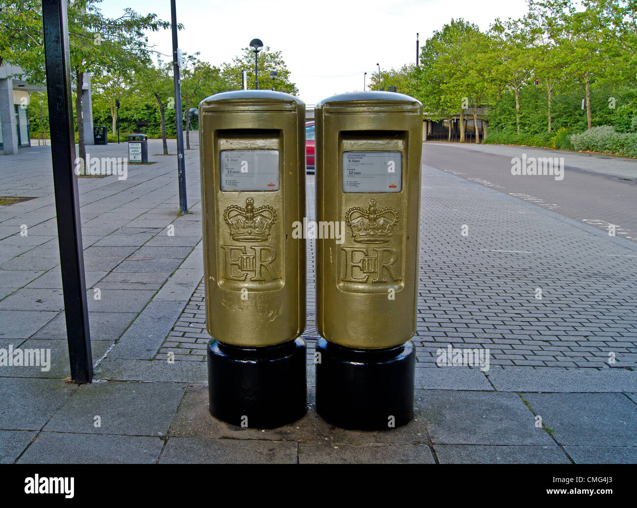 Milton Keynes 5/08/12 Silbury Boulevard Two post boxes painted gold in ...
