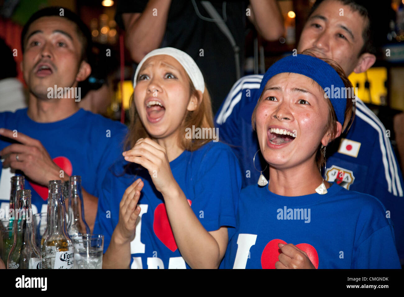 August 07 2012, Tokyo, Japan - Japanese fans watch the London Olympics ...