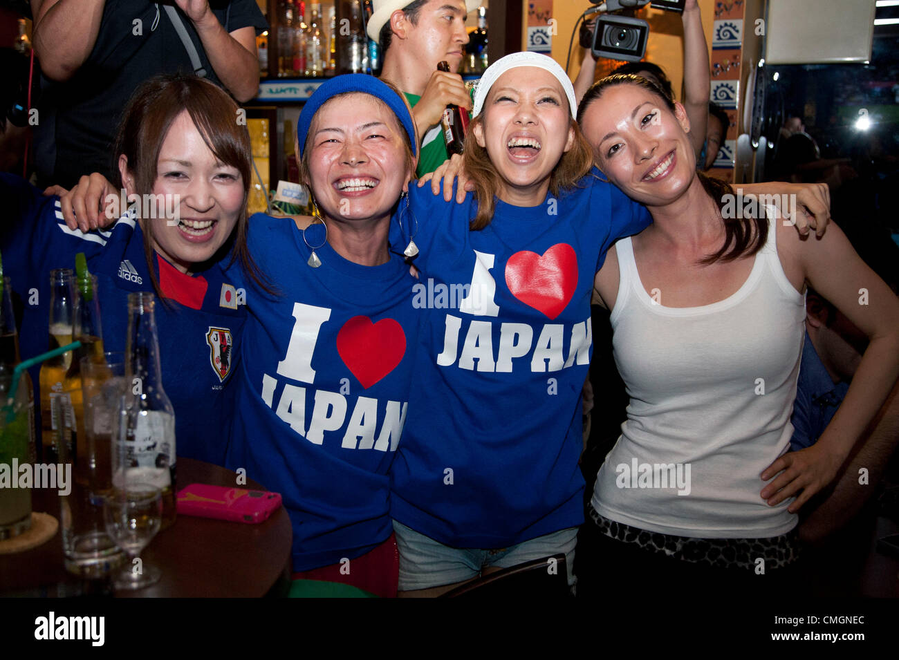 August 07 2012, Tokyo, Japan - Japanese and Mexican fans watch the ...