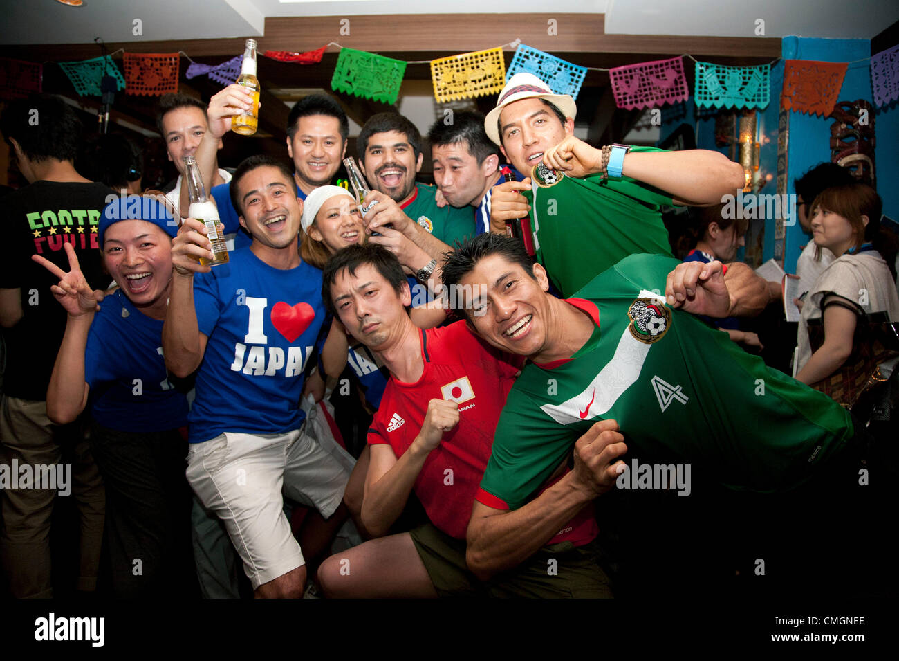 August 07 2012, Tokyo, Japan - Mexican and Japanese fans celebrate the ...