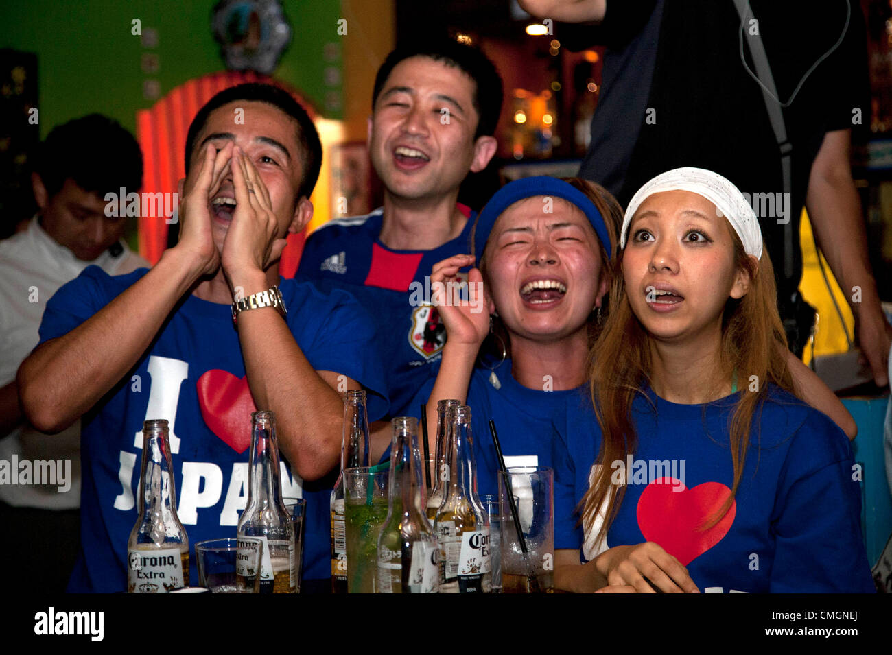 August 07 2012, Tokyo, Japan - Japanese fans watch the London Olympics ...