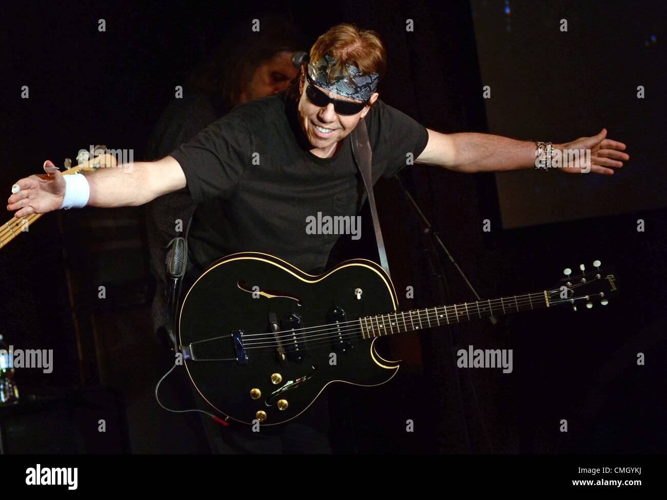 George Thorogood on stage for George Thorogood and the Destroyers In ...