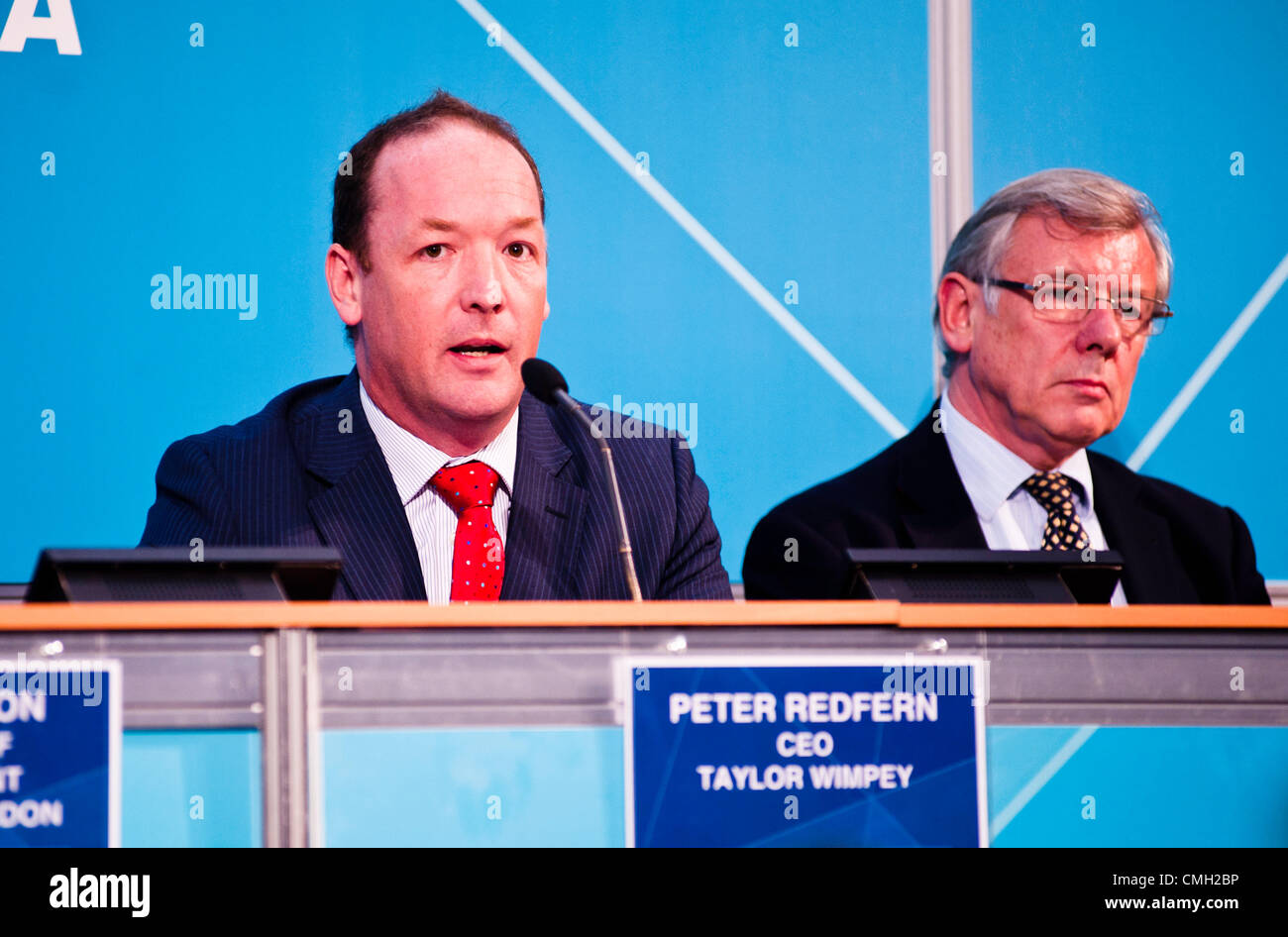 London, UK – 9 August 2012: Peter Redfern, CEO of Taylor Wimpey (L ...