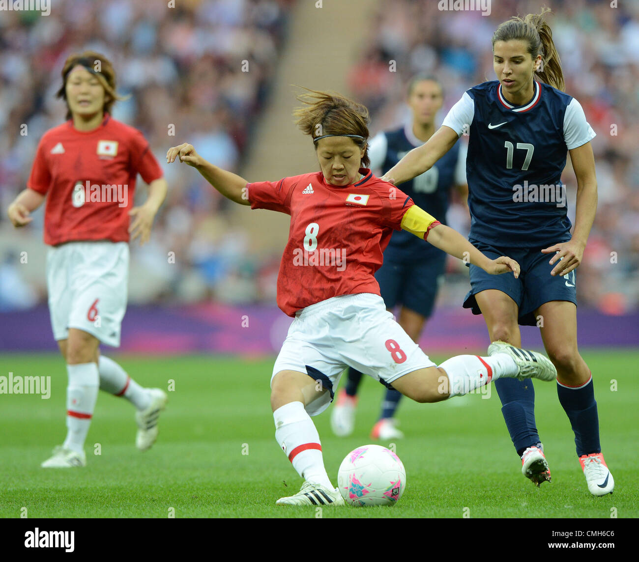 09.08.2012. London, England. Aya Miyama of Japan (front) gets her shot ...
