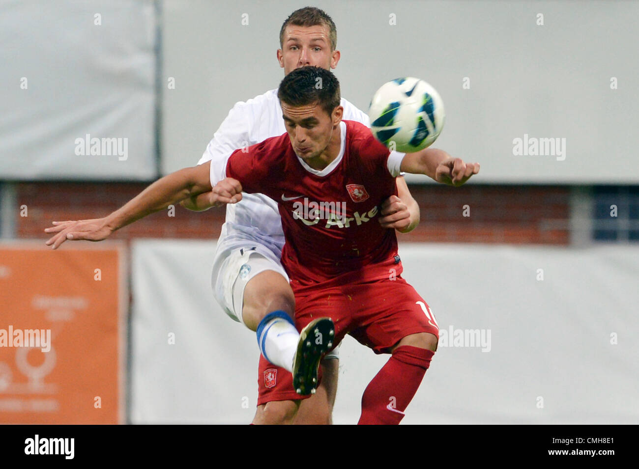 9th Aug 2012. Kristian Zbrozek (in white) of Mlada Boleslav and Donelas ...
