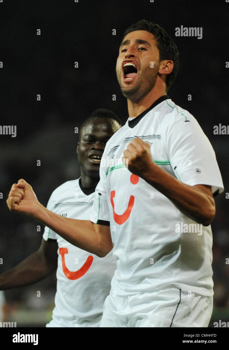 11.08.2012. Hanover, Germany. Hanover's Karim Haggui celebrates after ...
