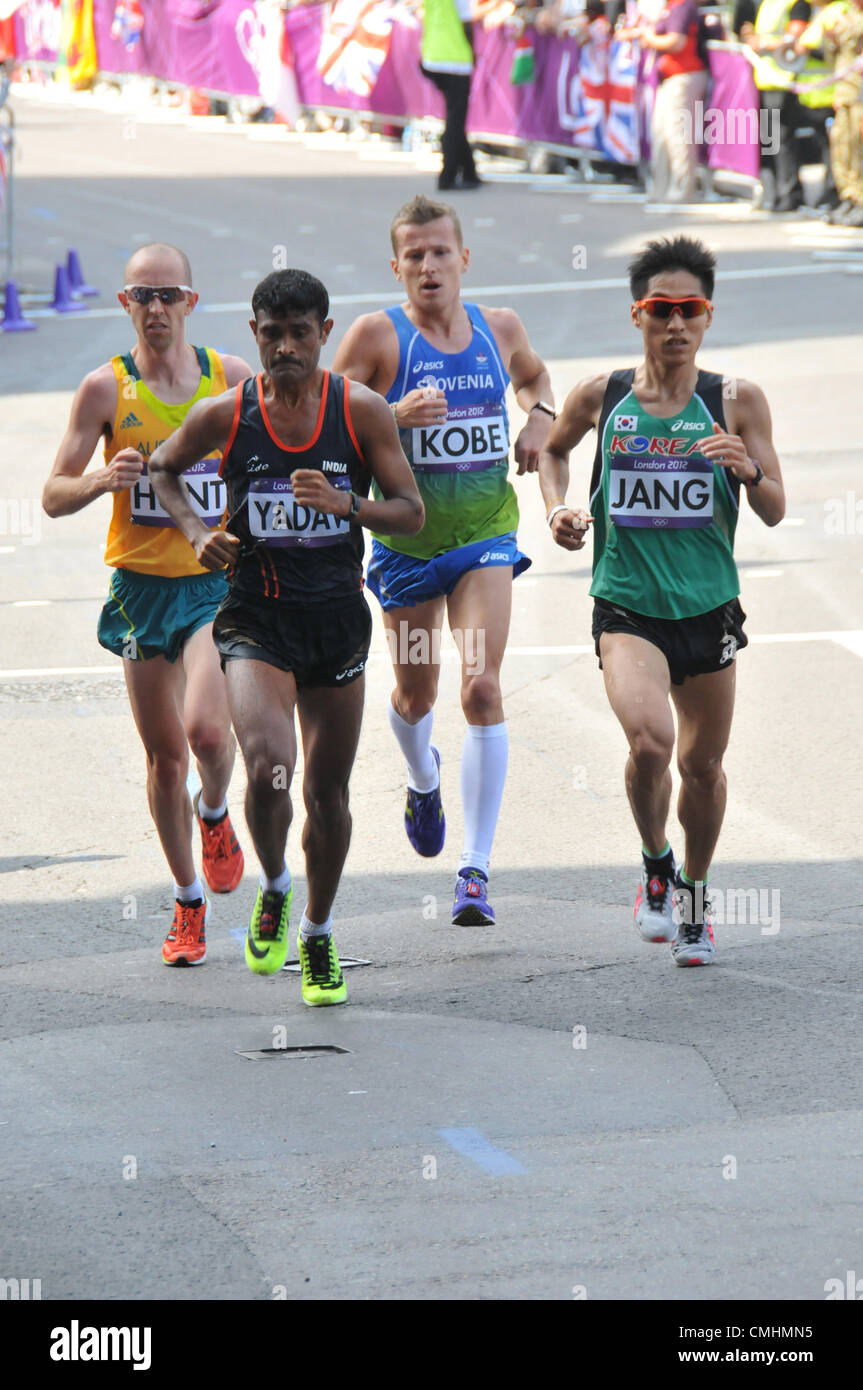 Trafalgar Square, London, UK. 12th August 2012. A group of runners in ...