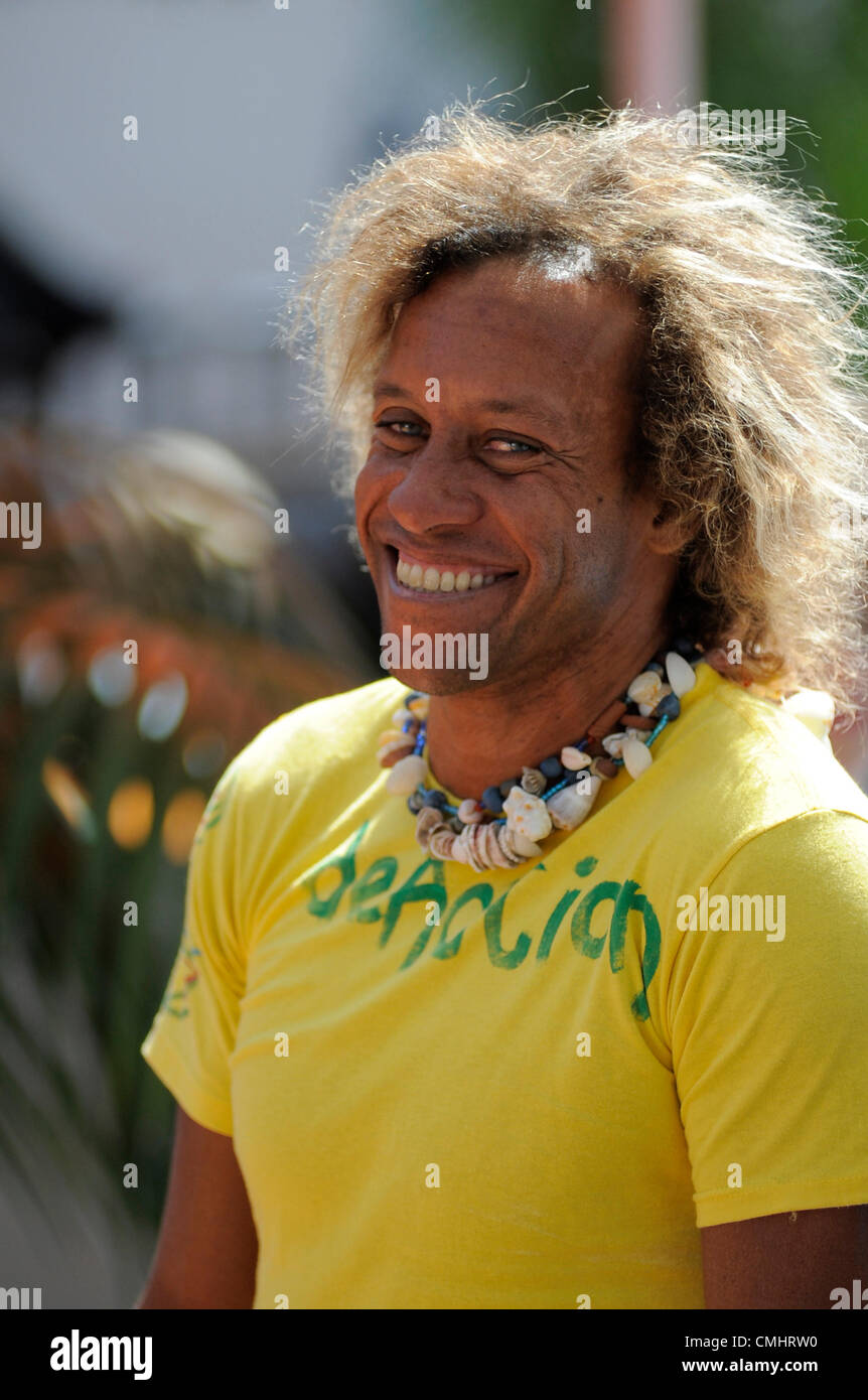 12th Aug 2012. Brian Talma, surf legend from Barbados, at the Surf ...