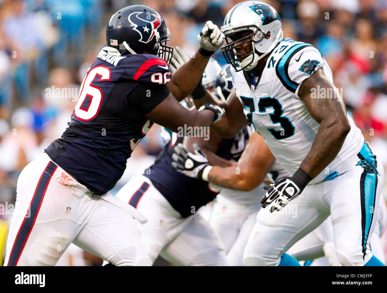 11th Aug 2012. Texans DE Tim Jamison (96) and Panthers RT Bruce Campbell (73) in action during ...